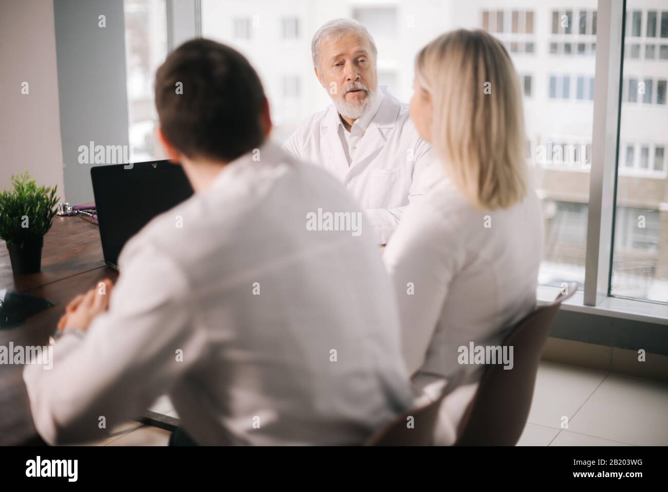 Team of experts doctors meeting in conference room Stock Photo - Alamy