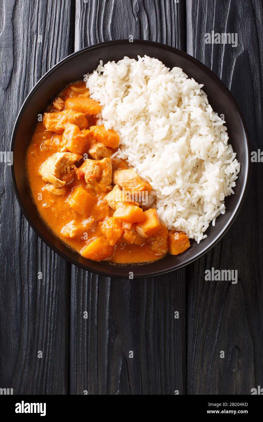 Gambian Domoda meat in peanut sauce served with rice in a dish on the ...