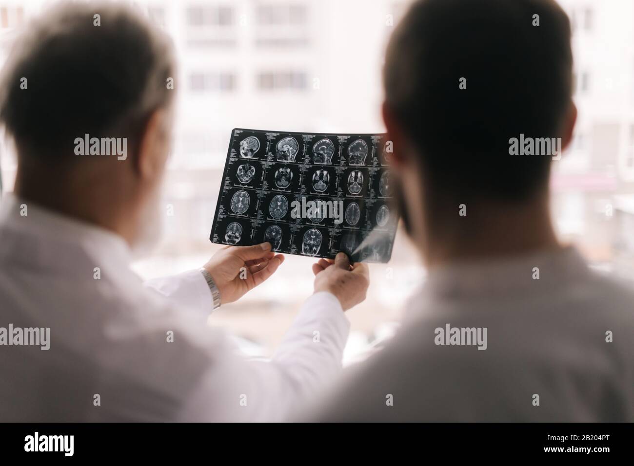 Two male medical doctors showing hi-res stock photography and images ...