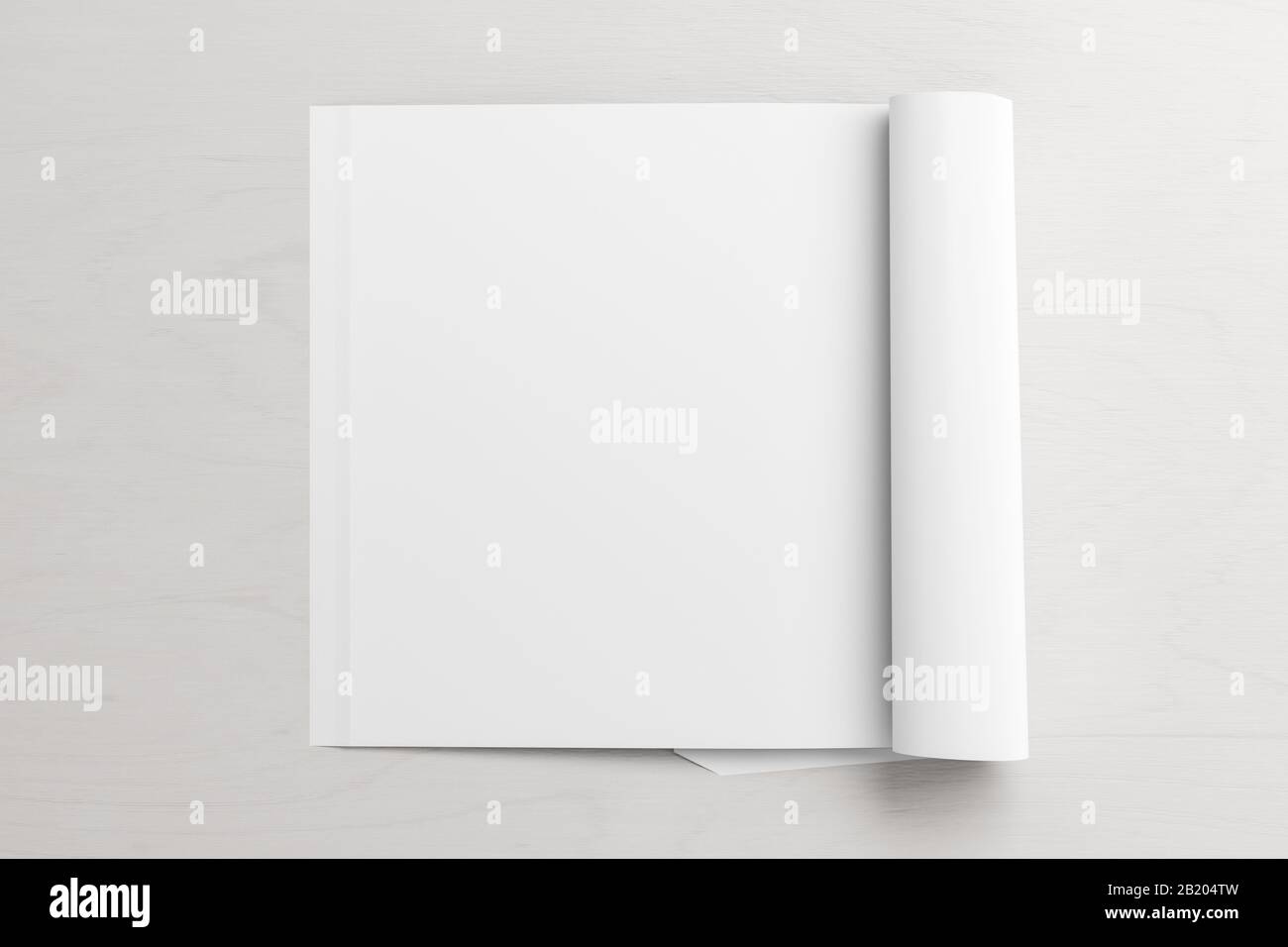 Blank square left magazine page. Workspace with folded magazine mock up ...