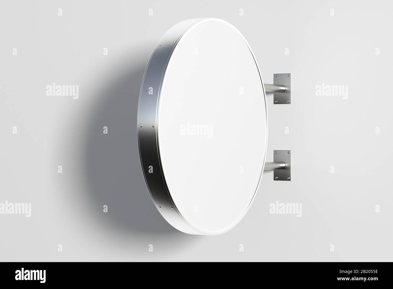 Round singboard or signage isolated on the white wall with blank white ...