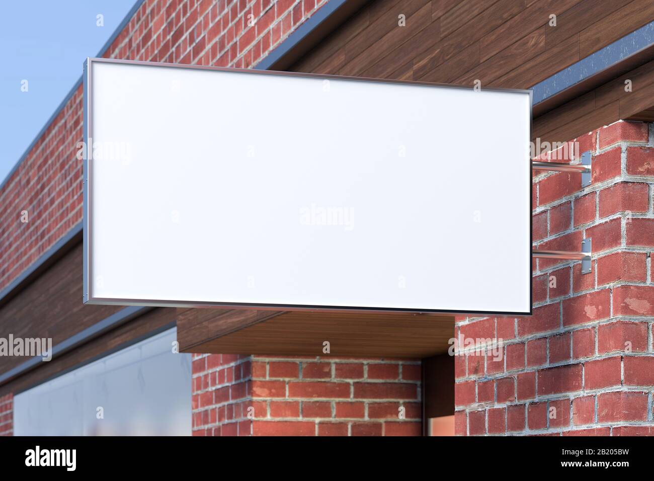 Horizontal singboard or signage on the red brick wall with blank white ...
