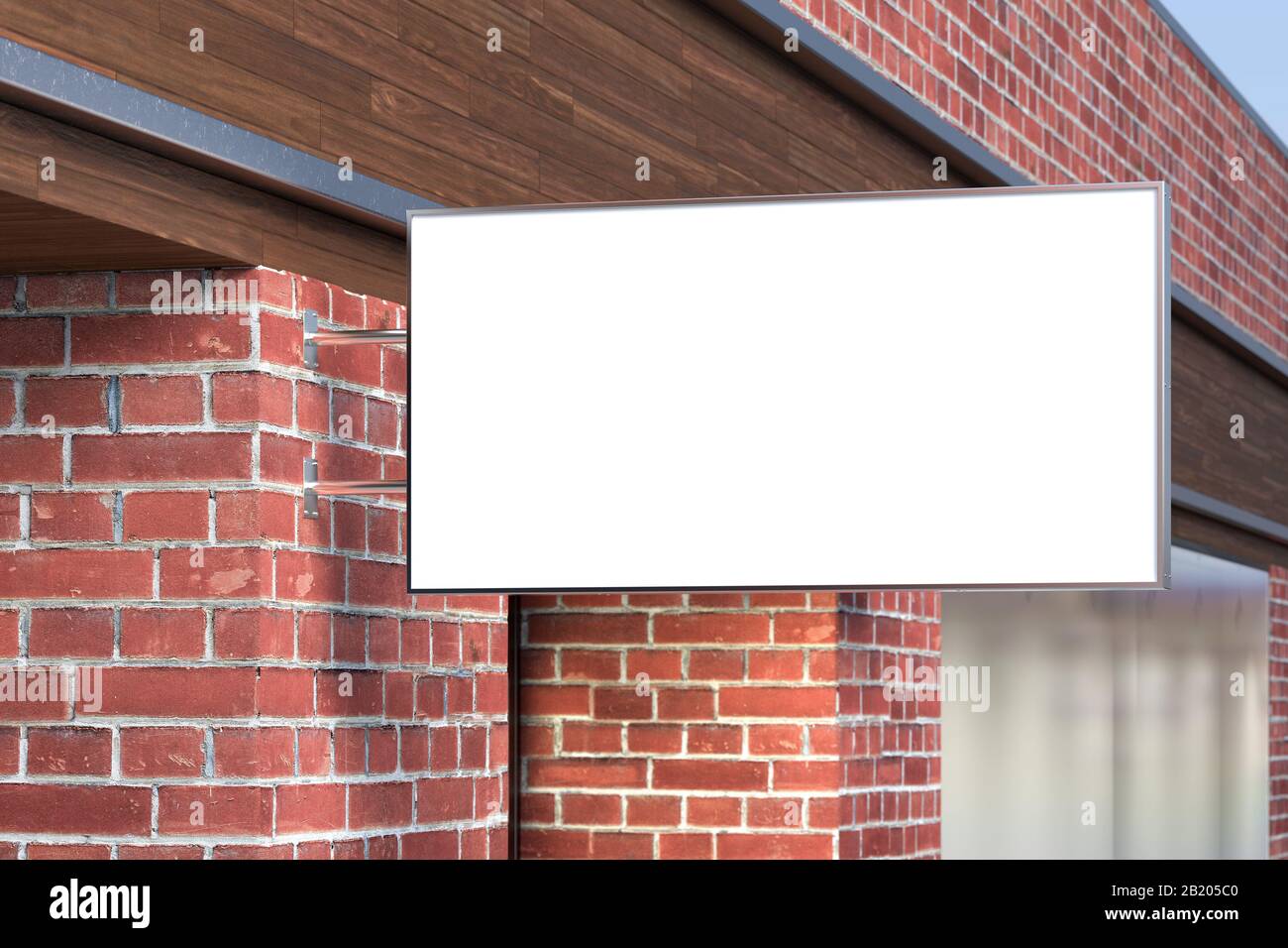Horizontal singboard or signage on the red brick wall with blank white ...
