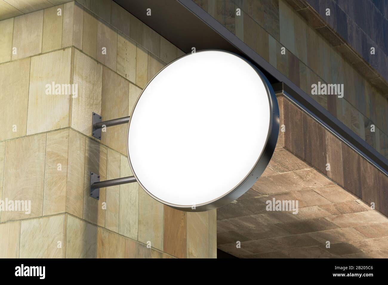 Round singboard or signage on the marble wall with blank luminescent ...