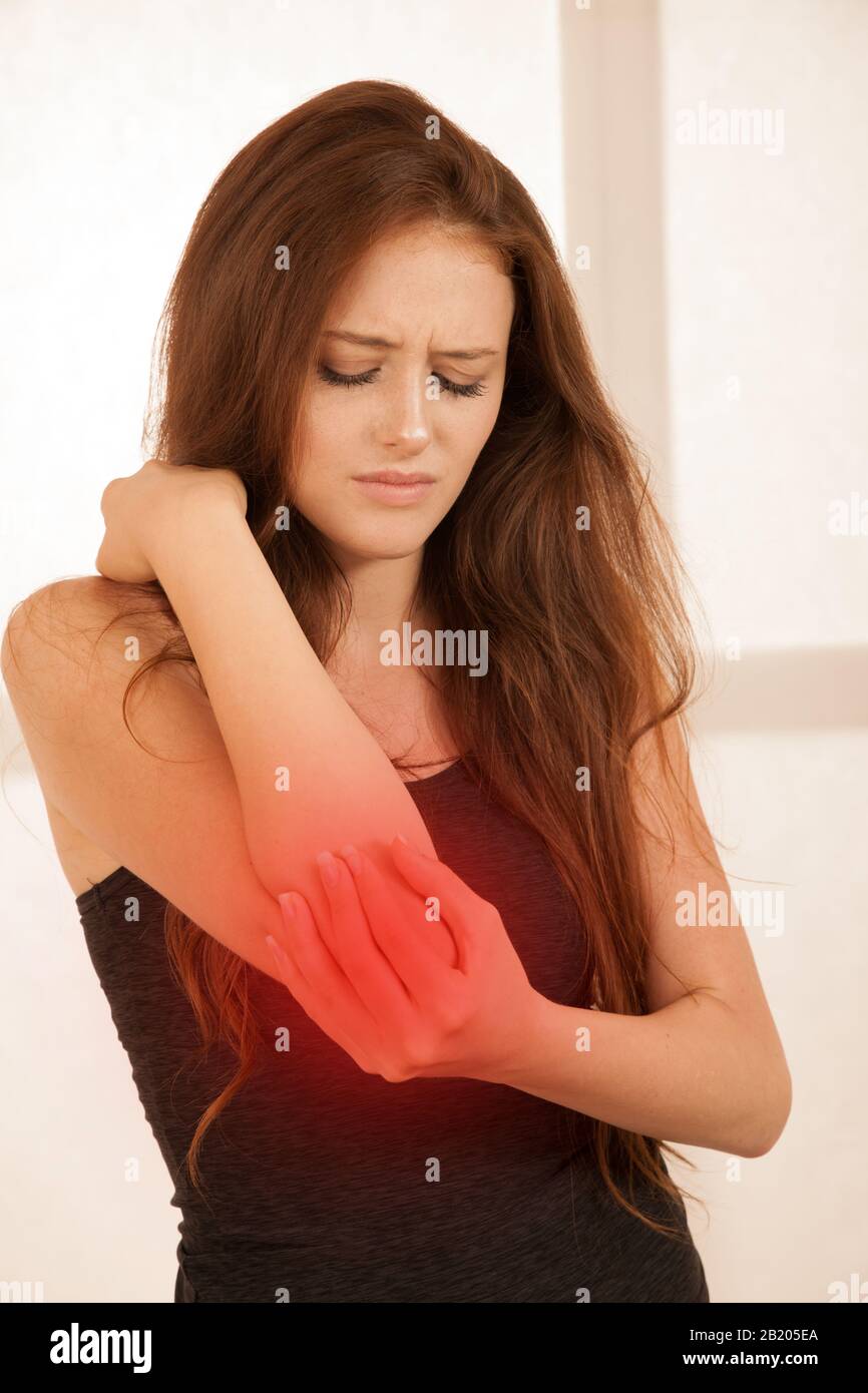 arm injury - Active young woman have injured elbow Stock Photo - Alamy