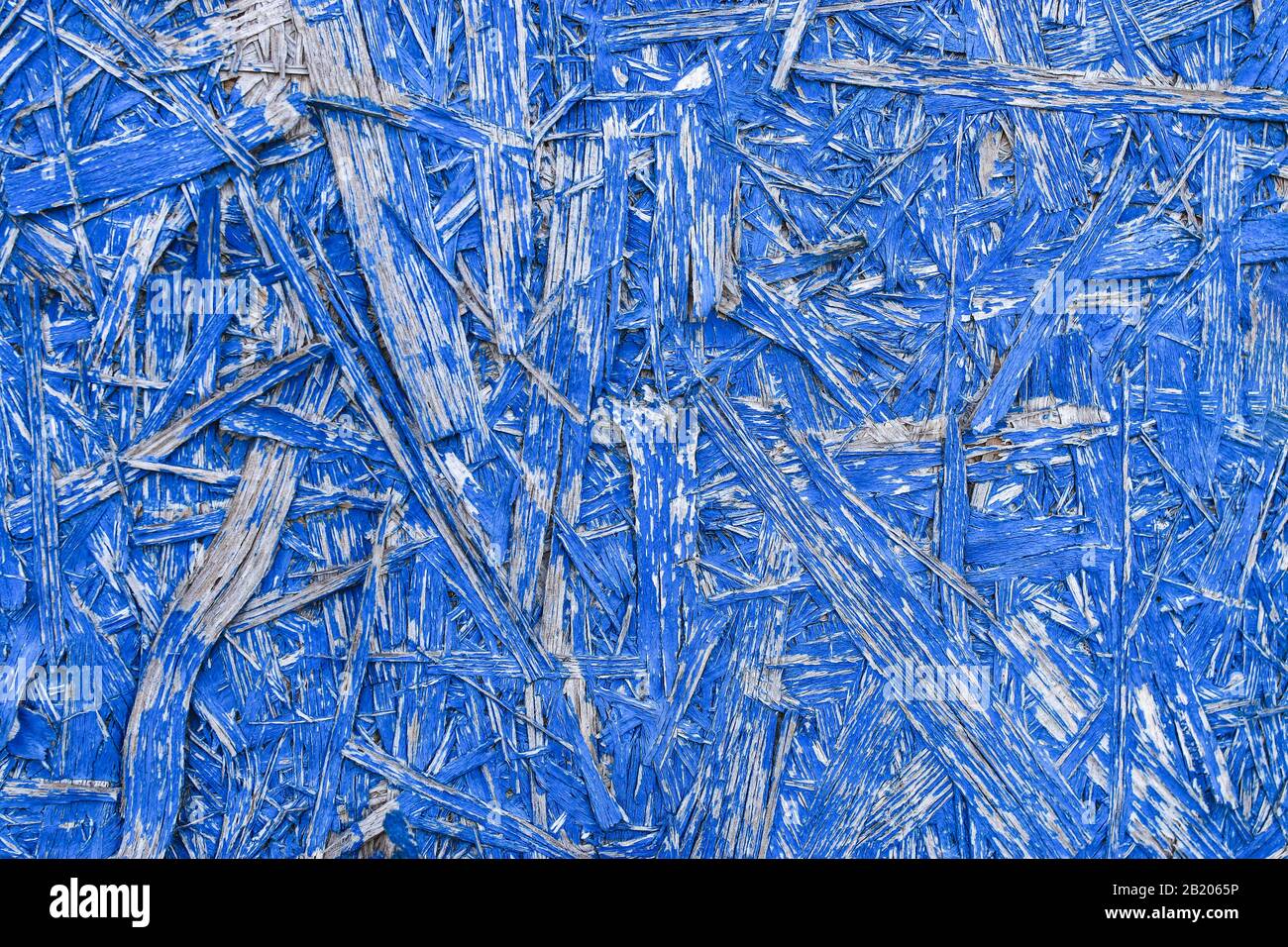 Blue abstract background with wooden texture. Painted OSB panel ...