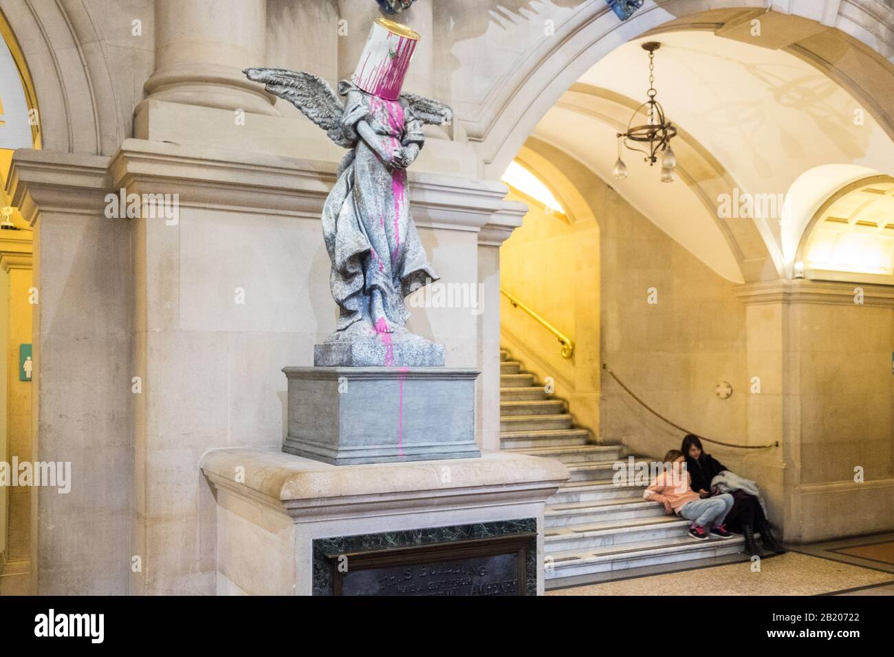 Banksys paint pot angel hi-res stock photography and images - Alamy