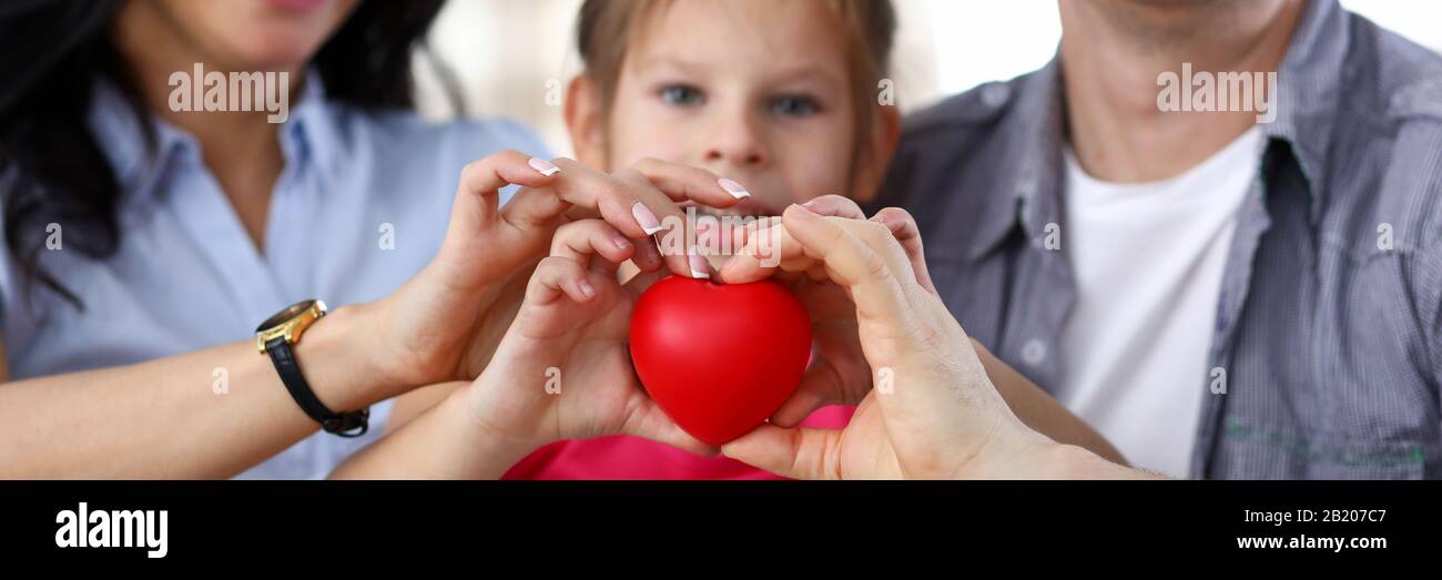 Smiling parents with kid Stock Photo - Alamy