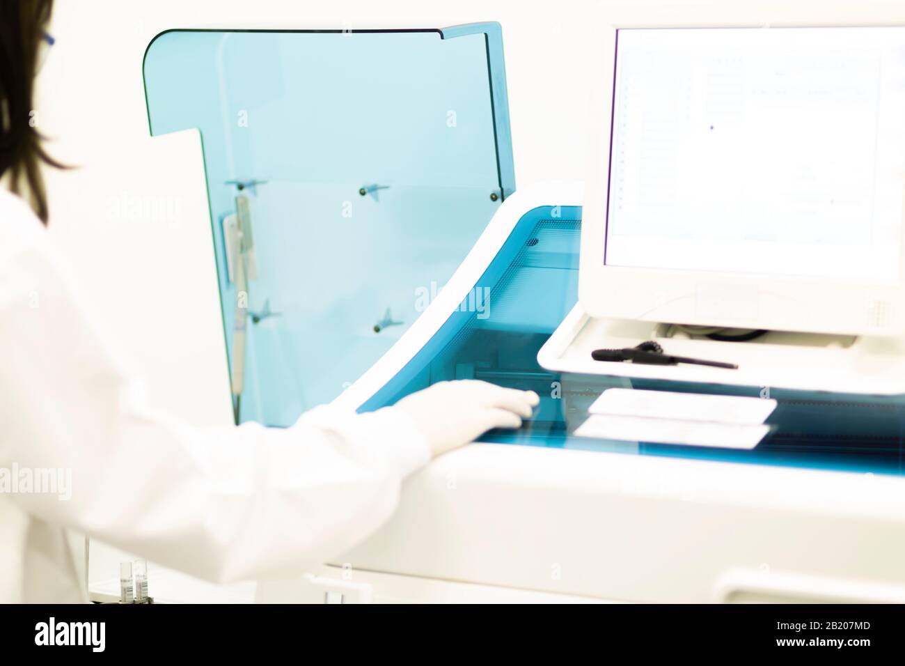 Female Nurse Working on Laptop Computer In Lab Stock Photo - Alamy