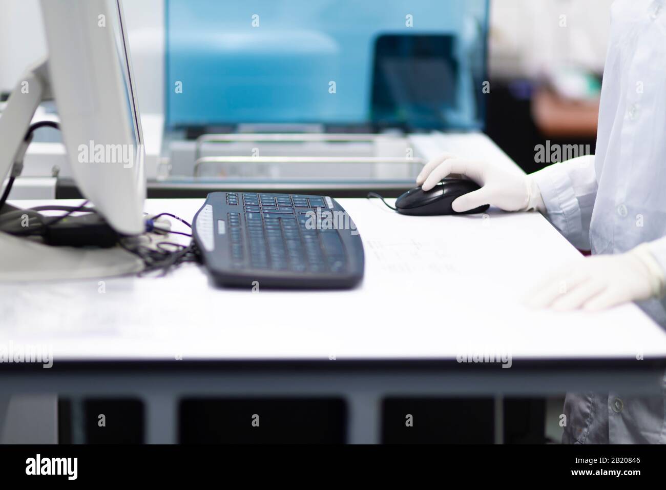 Female Nurse Working on Laptop Computer In Lab Stock Photo - Alamy