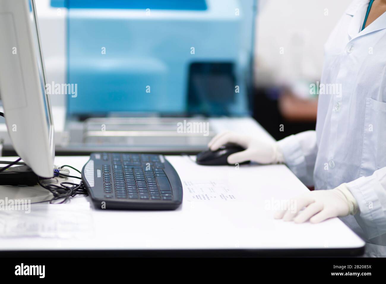 Female Nurse Working on Laptop Computer In Lab Stock Photo - Alamy