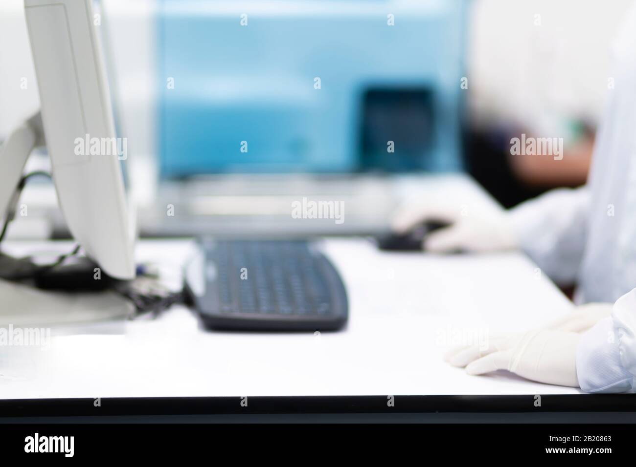 Female Nurse Working on Laptop Computer In Lab Stock Photo - Alamy