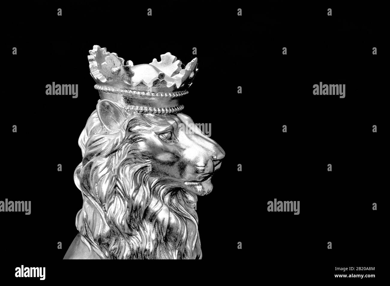silver lion with crown statue on black background , king of the animal ...