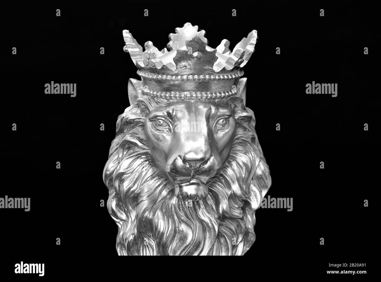 silver lion with crown statue on black background , king of the animal ...