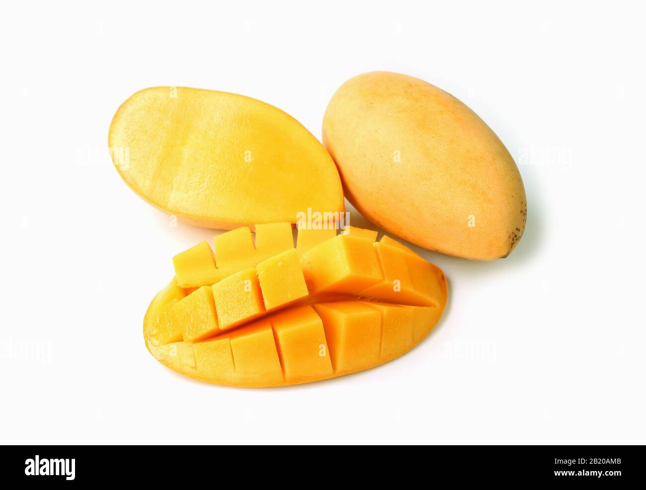 Mango fruit cut in half Cut Out Stock Images & Pictures - Alamy