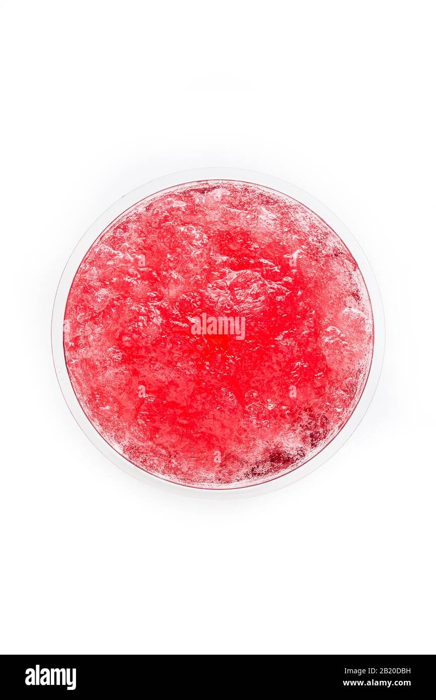 Red slushie in plastic cup isolated on white background Stock Photo - Alamy