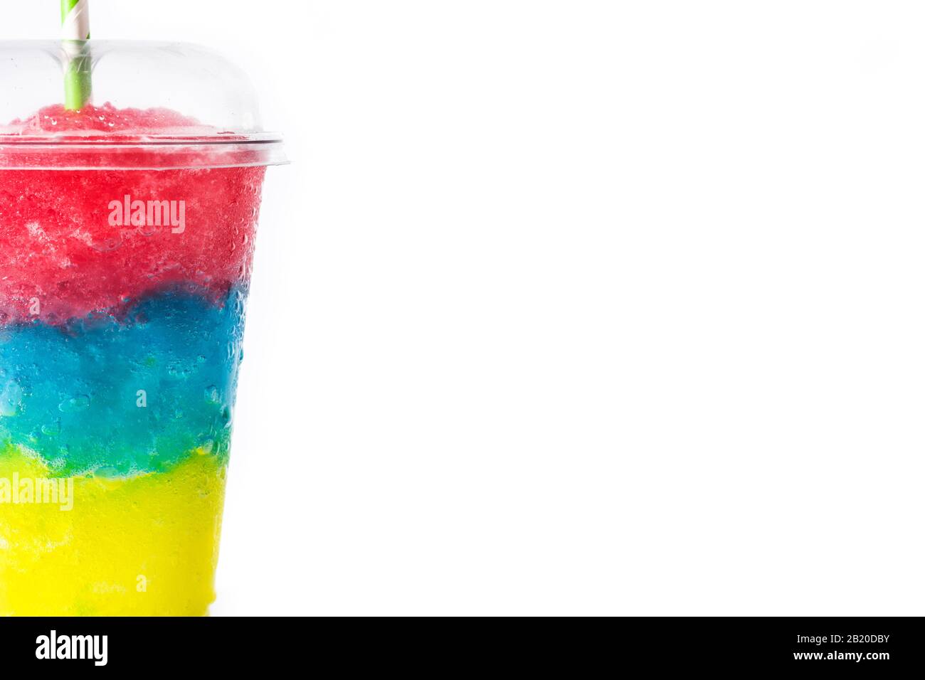 Colorful slushie of differents flavors with straw in plastic cup ...