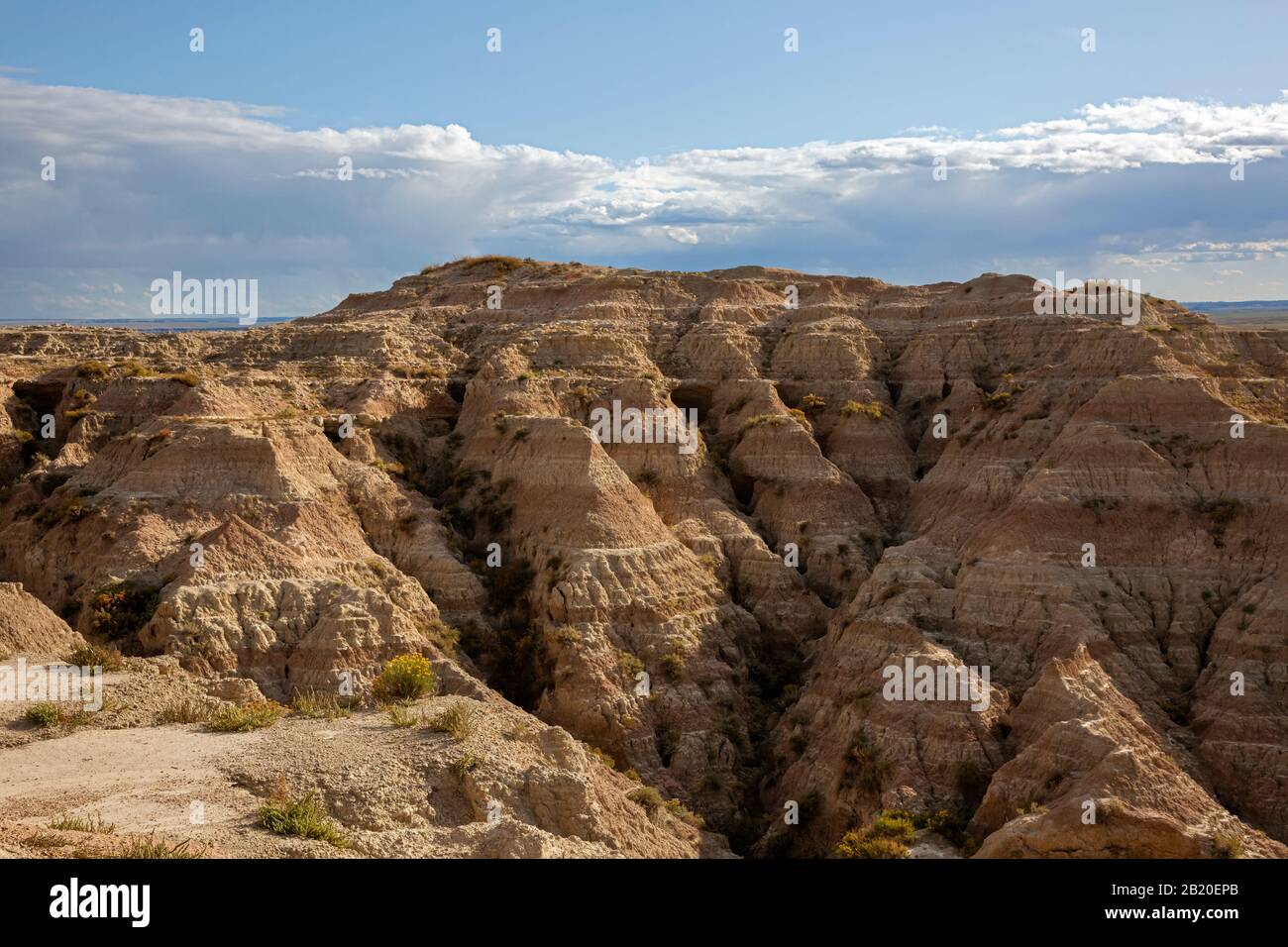 SD00230-00....SOUTH DAKOTA - Weathered and eroded, layered butte viewed ...