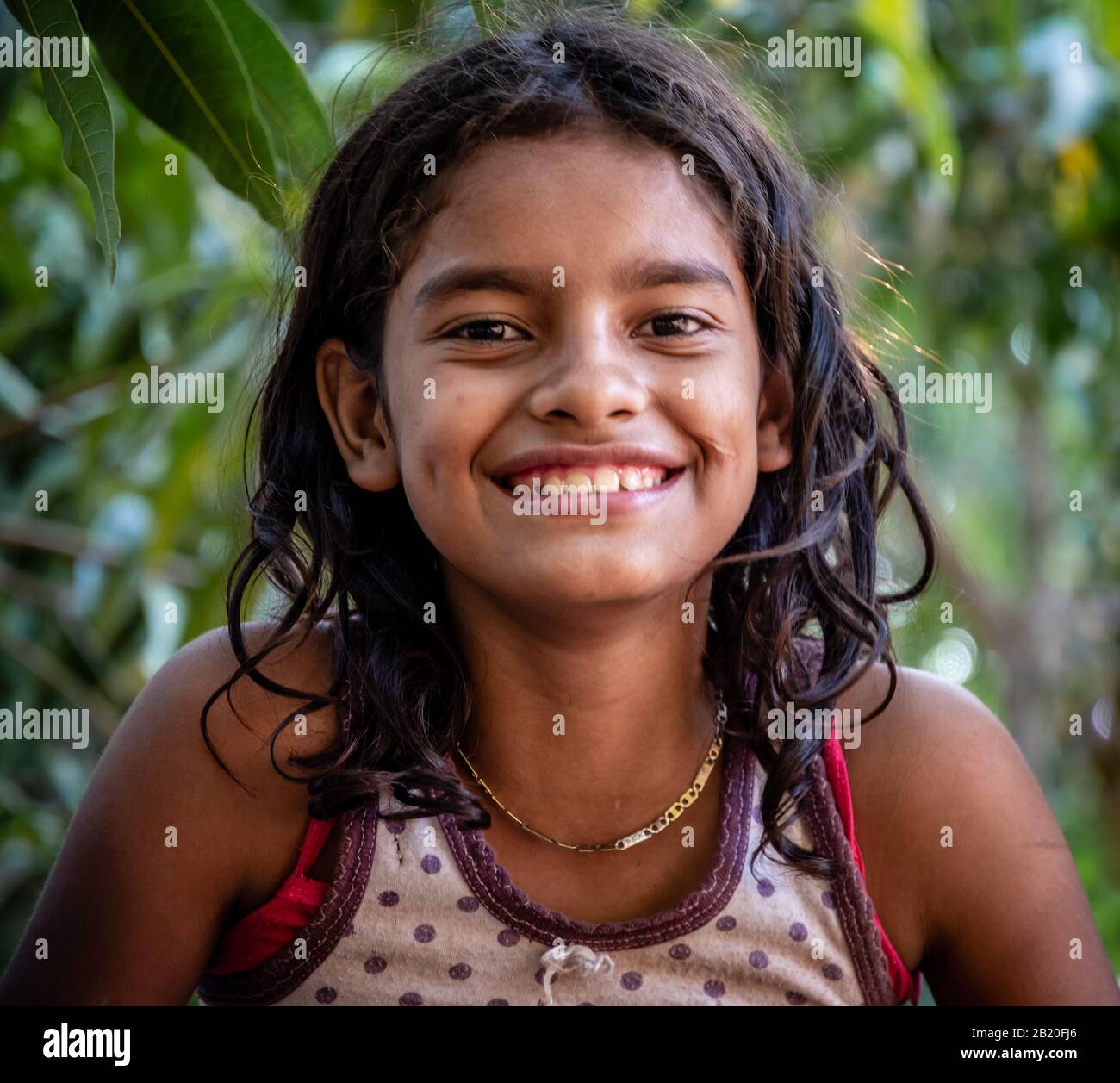 portrait of young hispanic girl smiling in Guatemalan village Stock Photo - Alamy