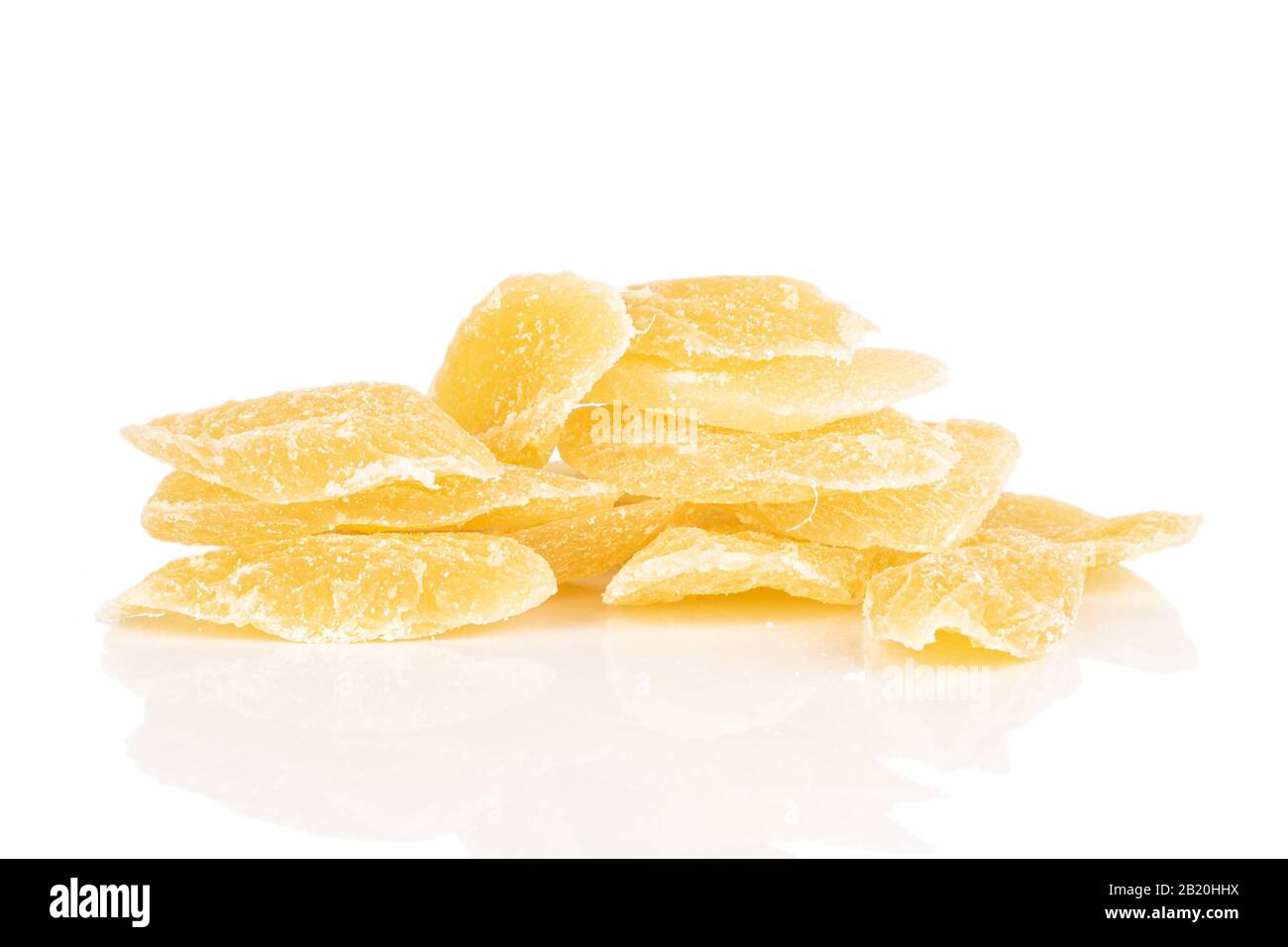 Lot of slices of dried yellow pineapple stack isolated on white ...