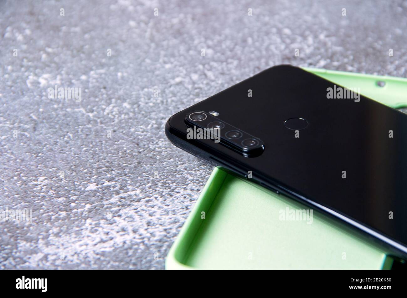 Mobile phone with four cameras. Modern device Stock Photo - Alamy
