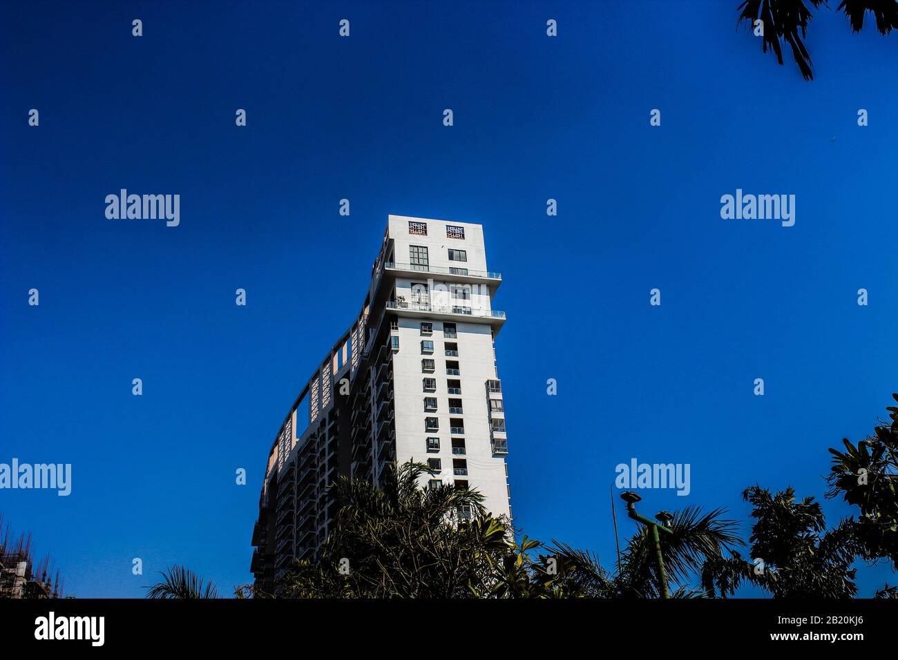 A picture of building with sky background Stock Photo - Alamy