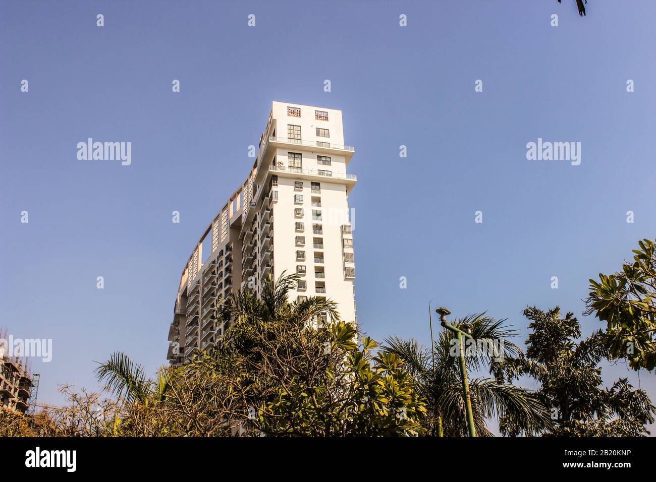 A picture of building with sky background Stock Photo - Alamy