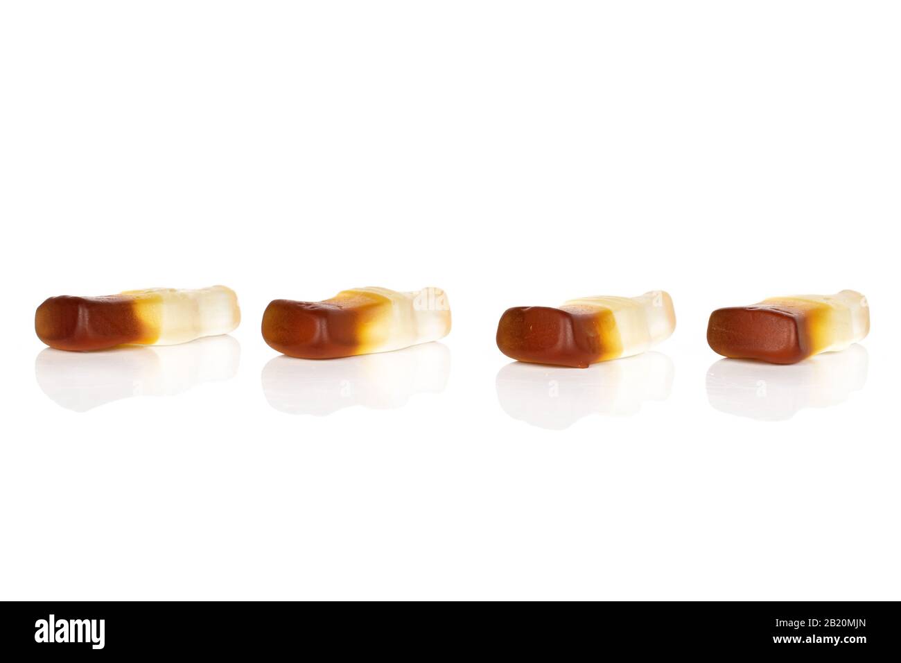 Group of four whole sweet jelly cola line isolated on white background ...