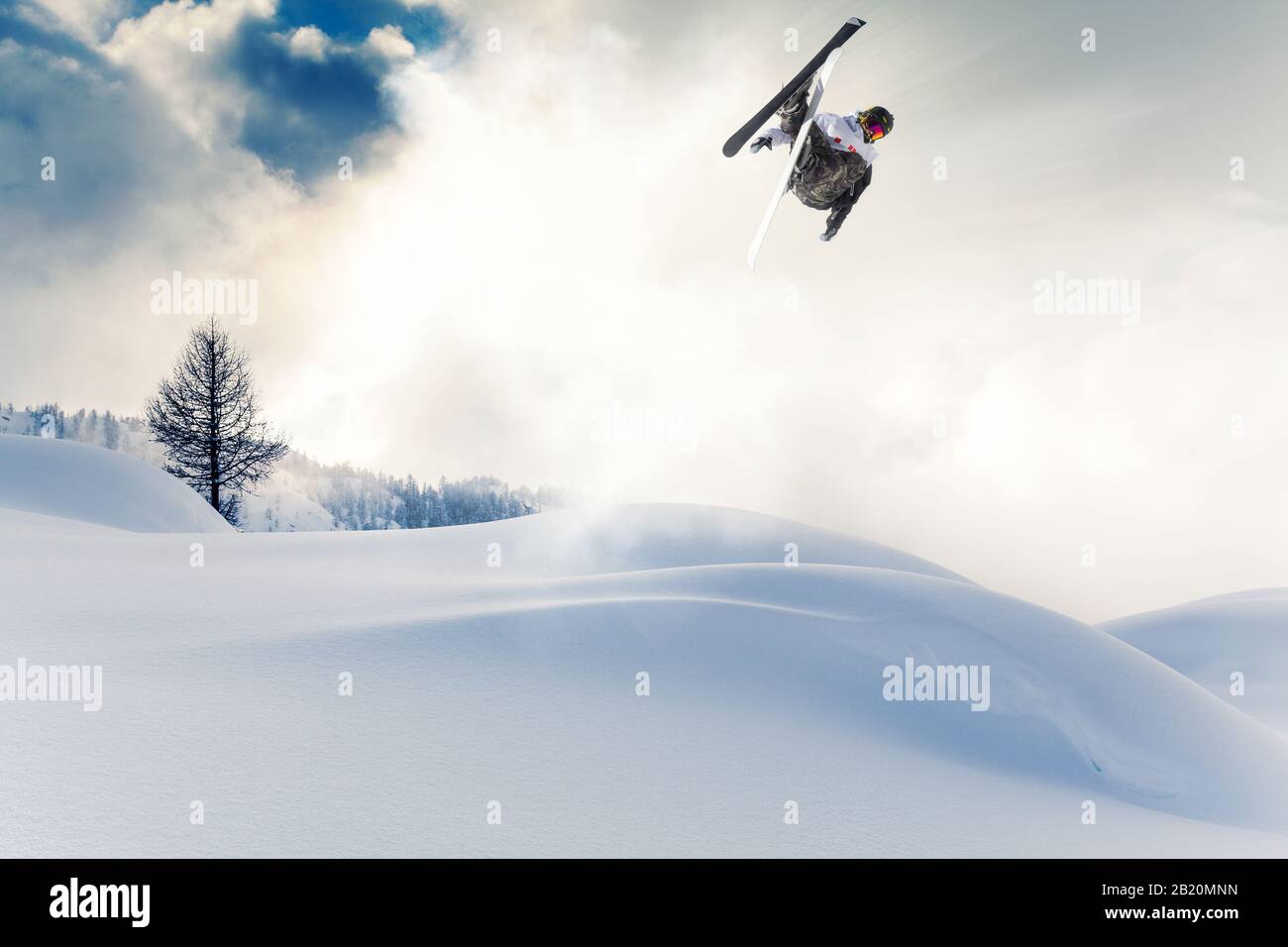 acrobatic freestyle jump on skis Stock Photo - Alamy