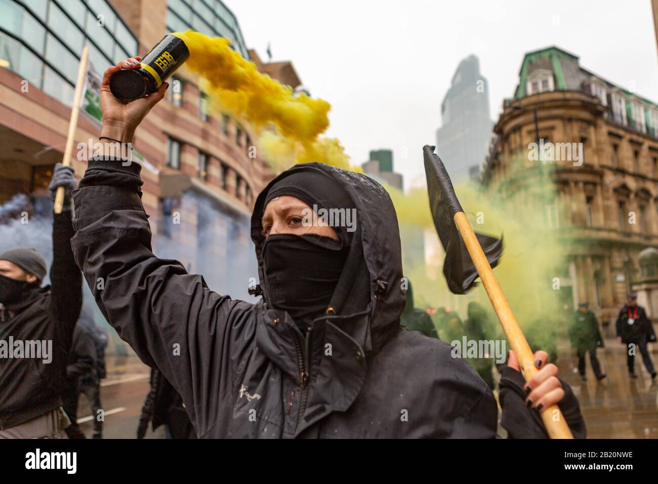 London, UK. 28th Feb, 2020. Anarchist protesters march towards the ...