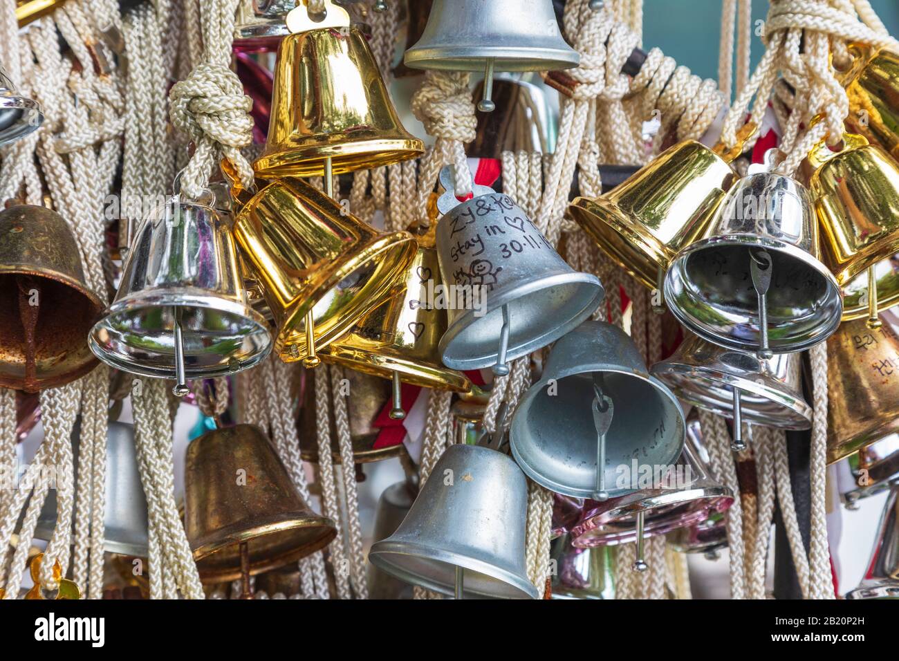 Small love bells, a token of affection, attached to the railings and ...