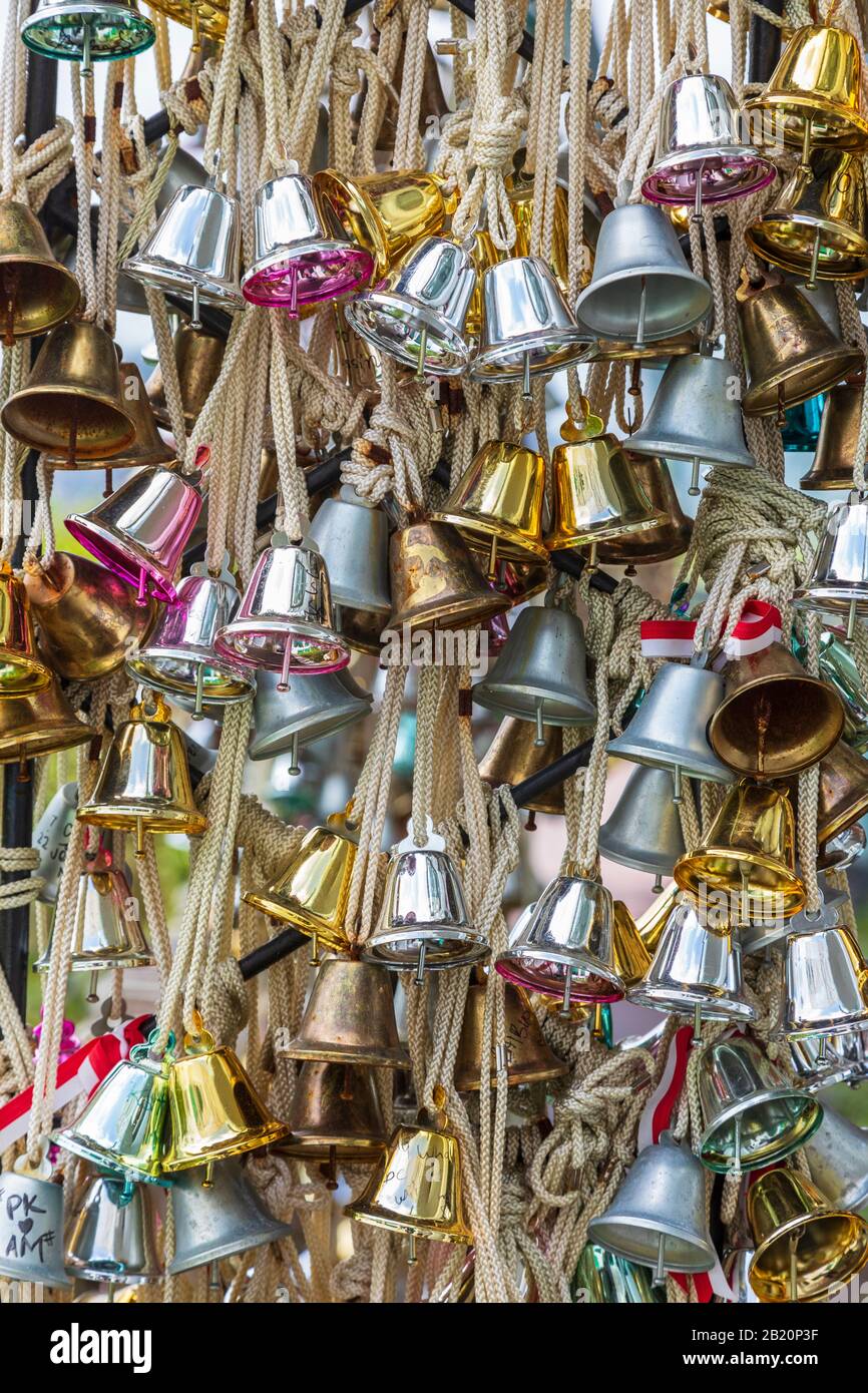Small love bells, a token of affection, attached to the railings and ...