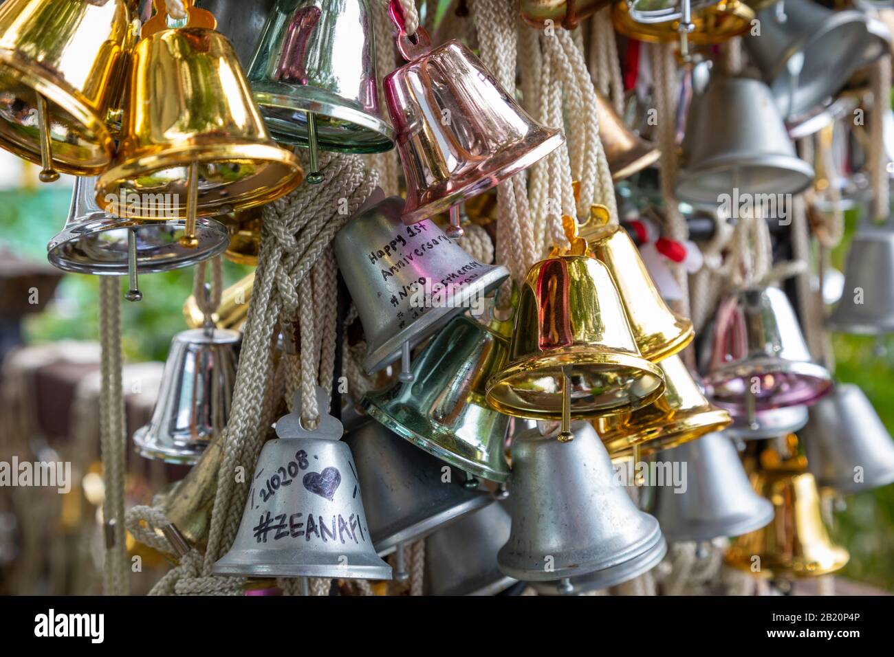 Small love bells, a token of affection, attached to the railings and ...