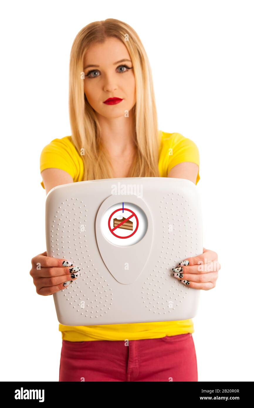 Fit young woman holding a scale hi-res stock photography and images - Alamy