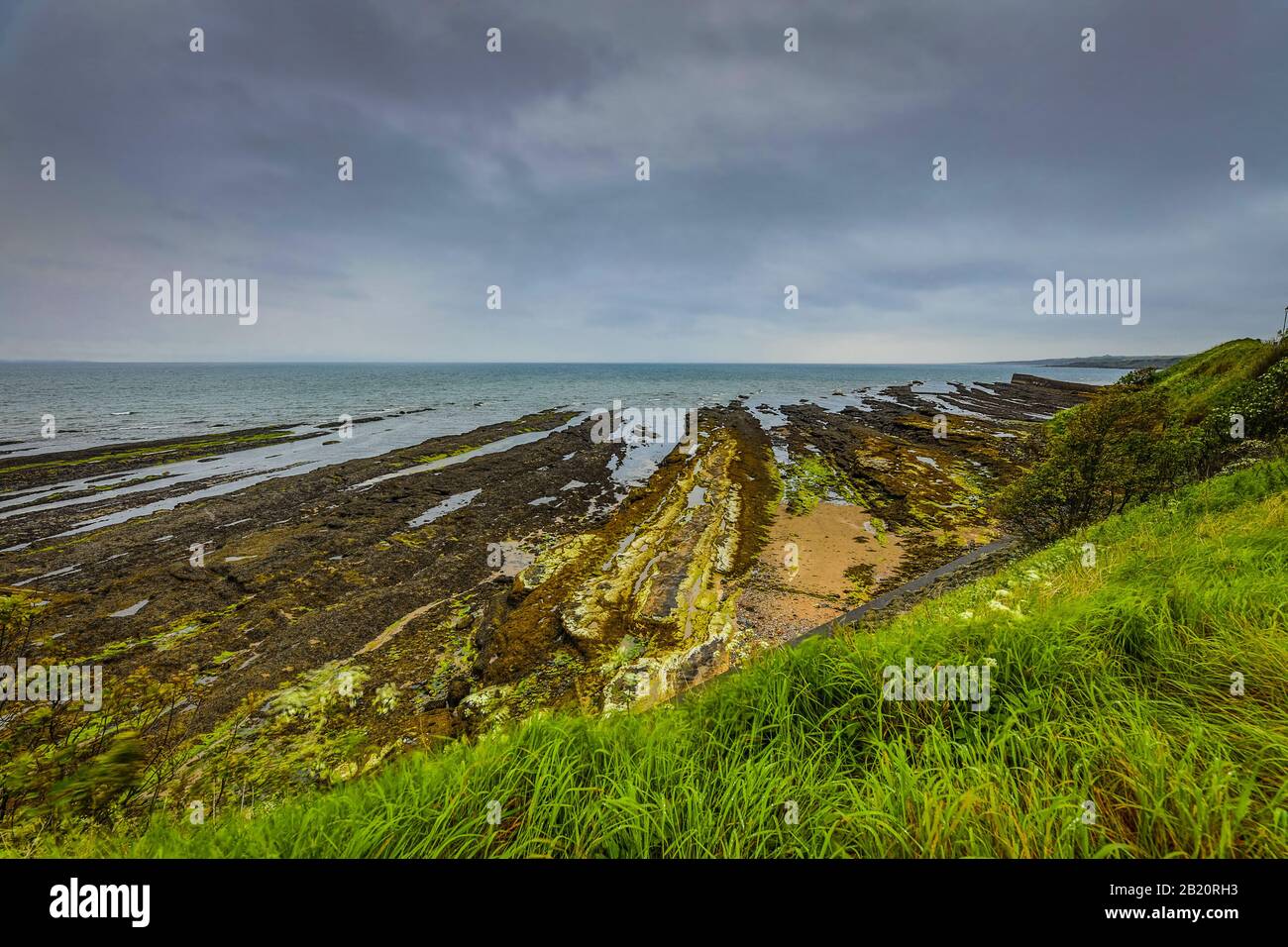 Waves breaking on coastal cliffs of Scotland Stock Photo - Alamy