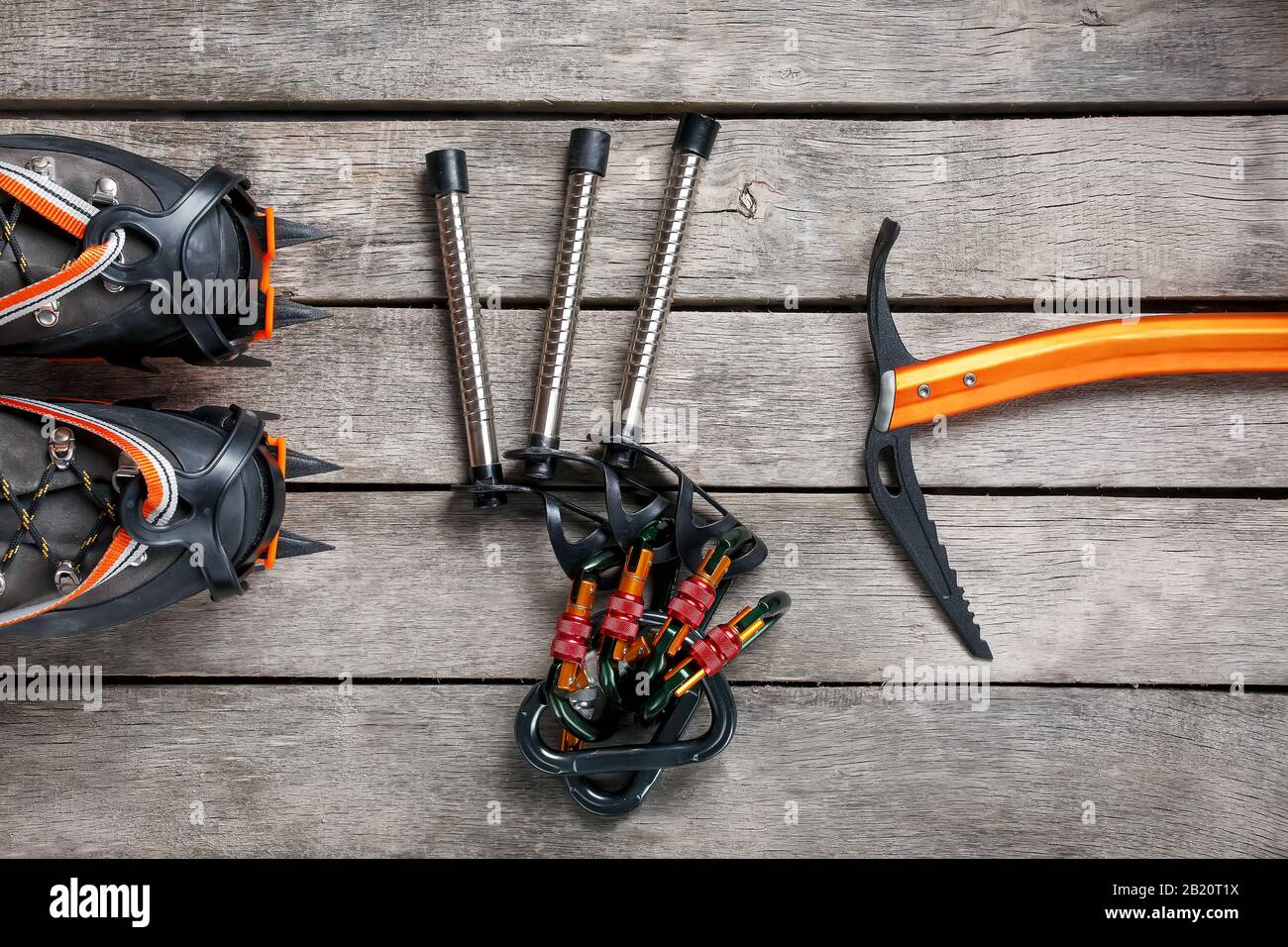 Top view of tourist equipment for a mountain trip on a rustic light ...