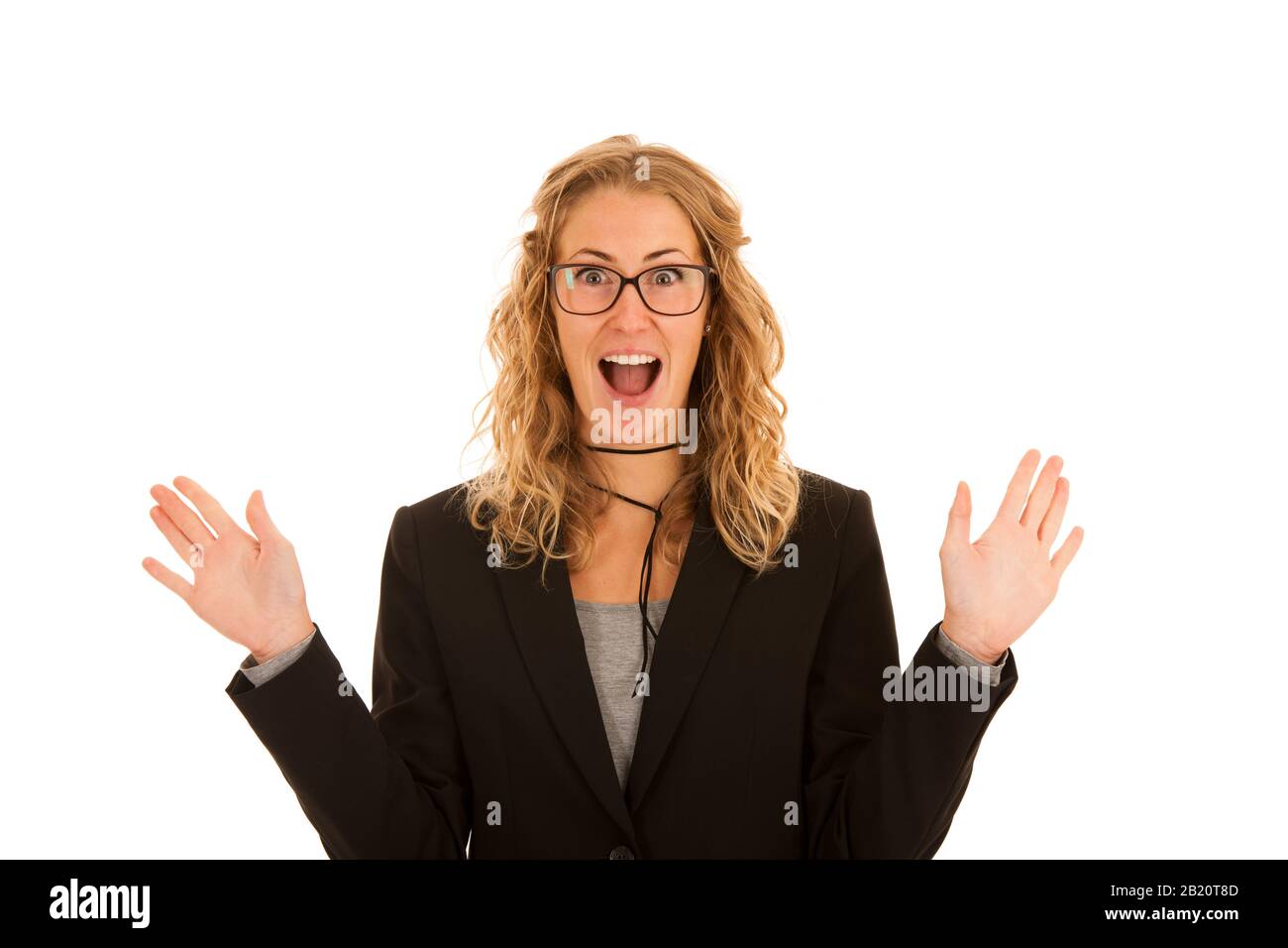 Excited business woman with hands up screaming isolated over white ...