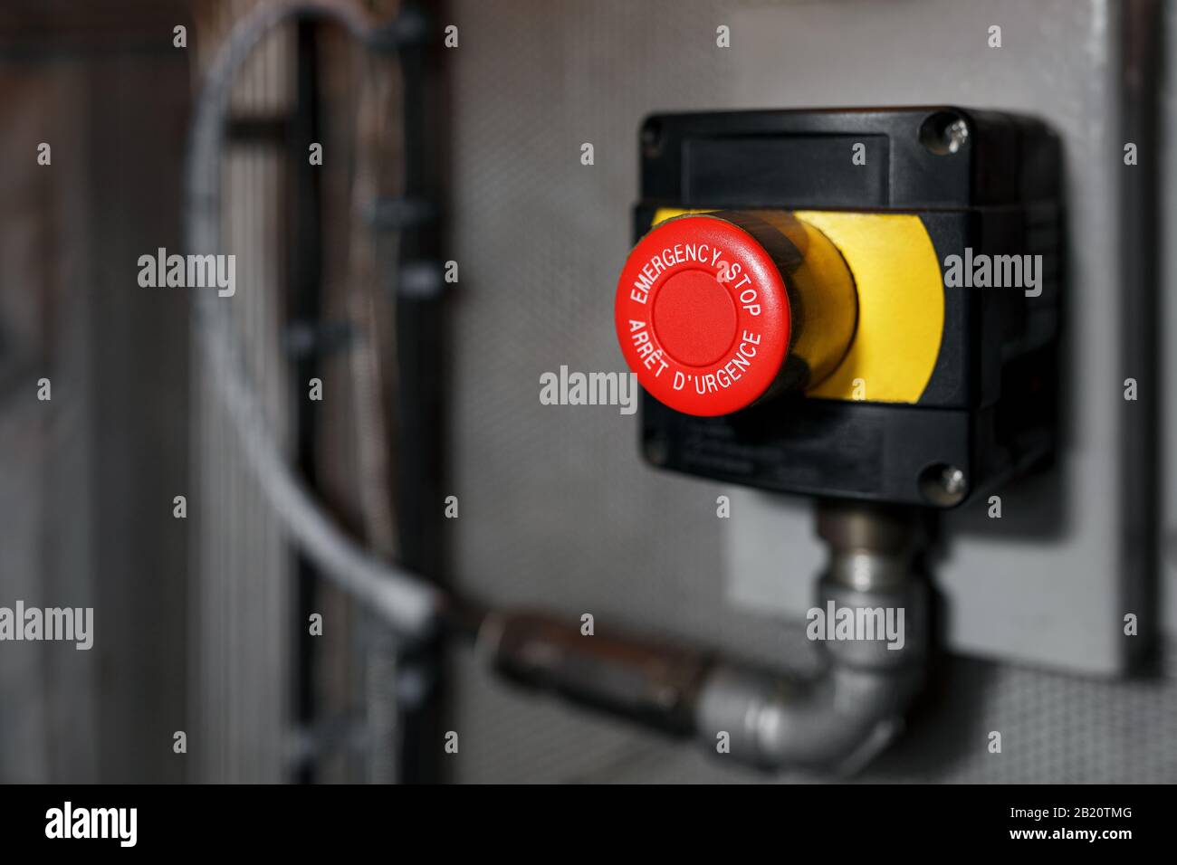 The red emergency button or stop button for Hand press. STOP Button for ...