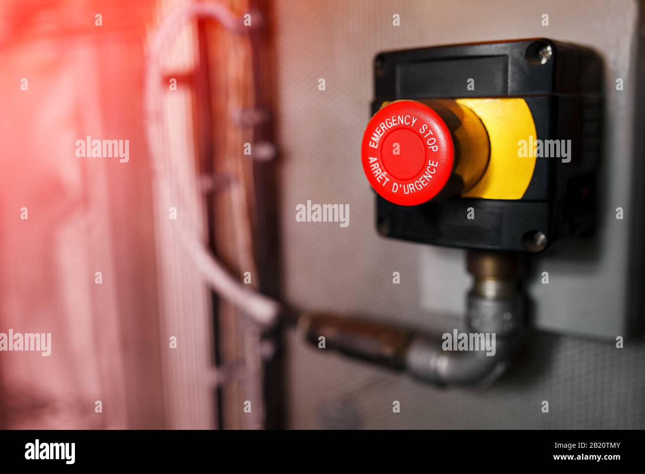 The red emergency button or stop button for Hand press. STOP Button for ...