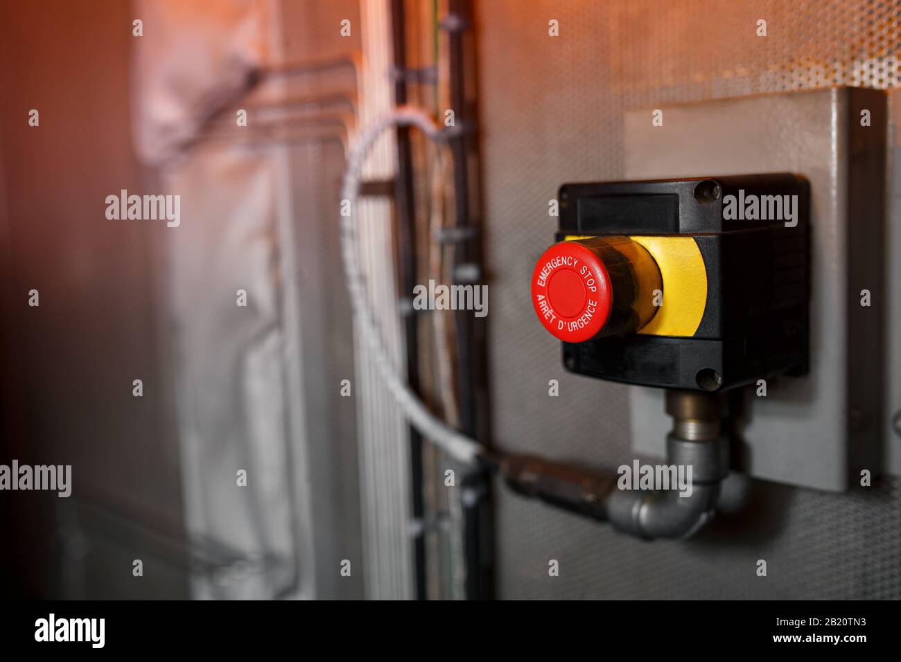 The red emergency button or stop button for Hand press. STOP Button for ...