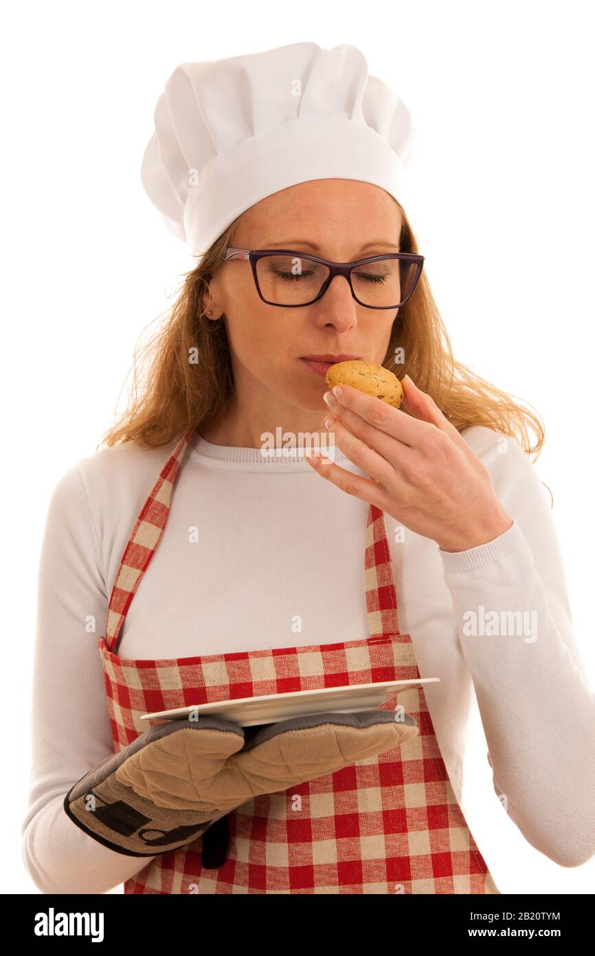 Woman chef serving a cookie Stock Photo - Alamy