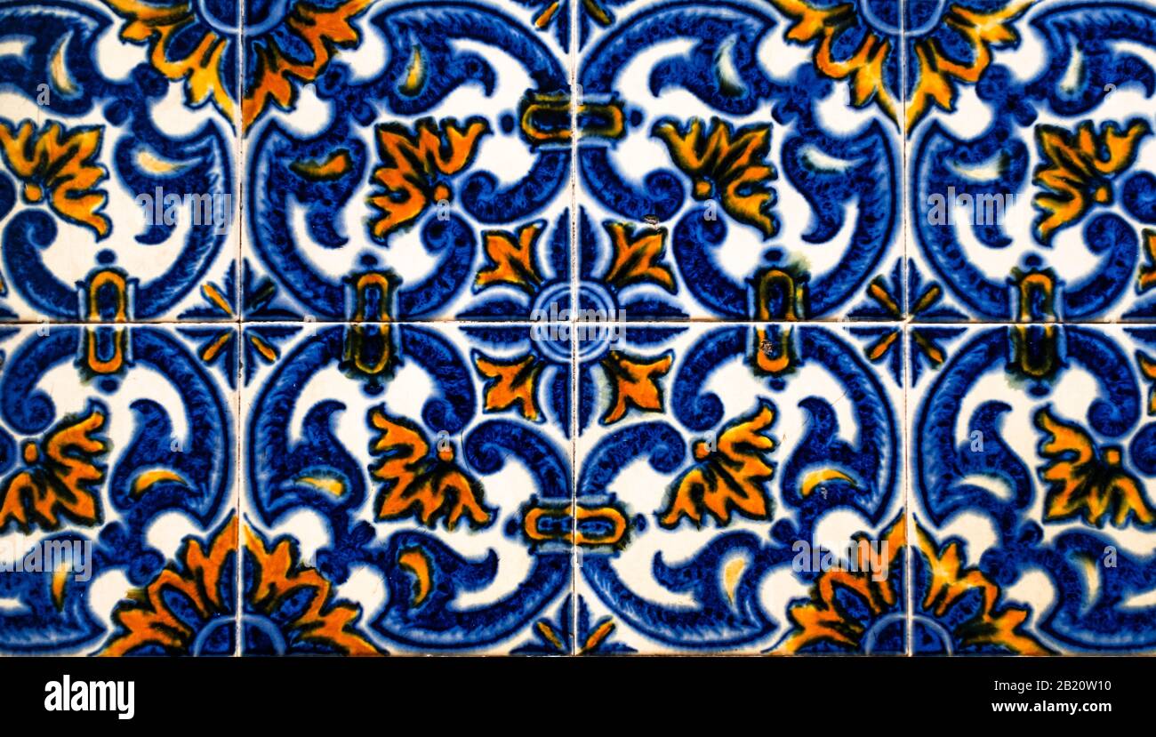 Portuguese traditional tiles Azulejos with blue and orange floral ...