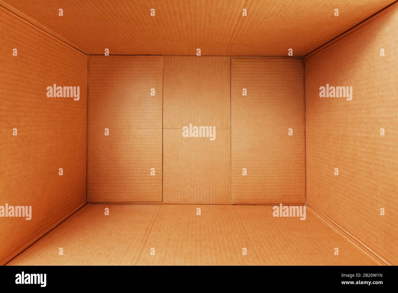 Empty cardboard box, inside view. Empty space for cargo, parcel and ...