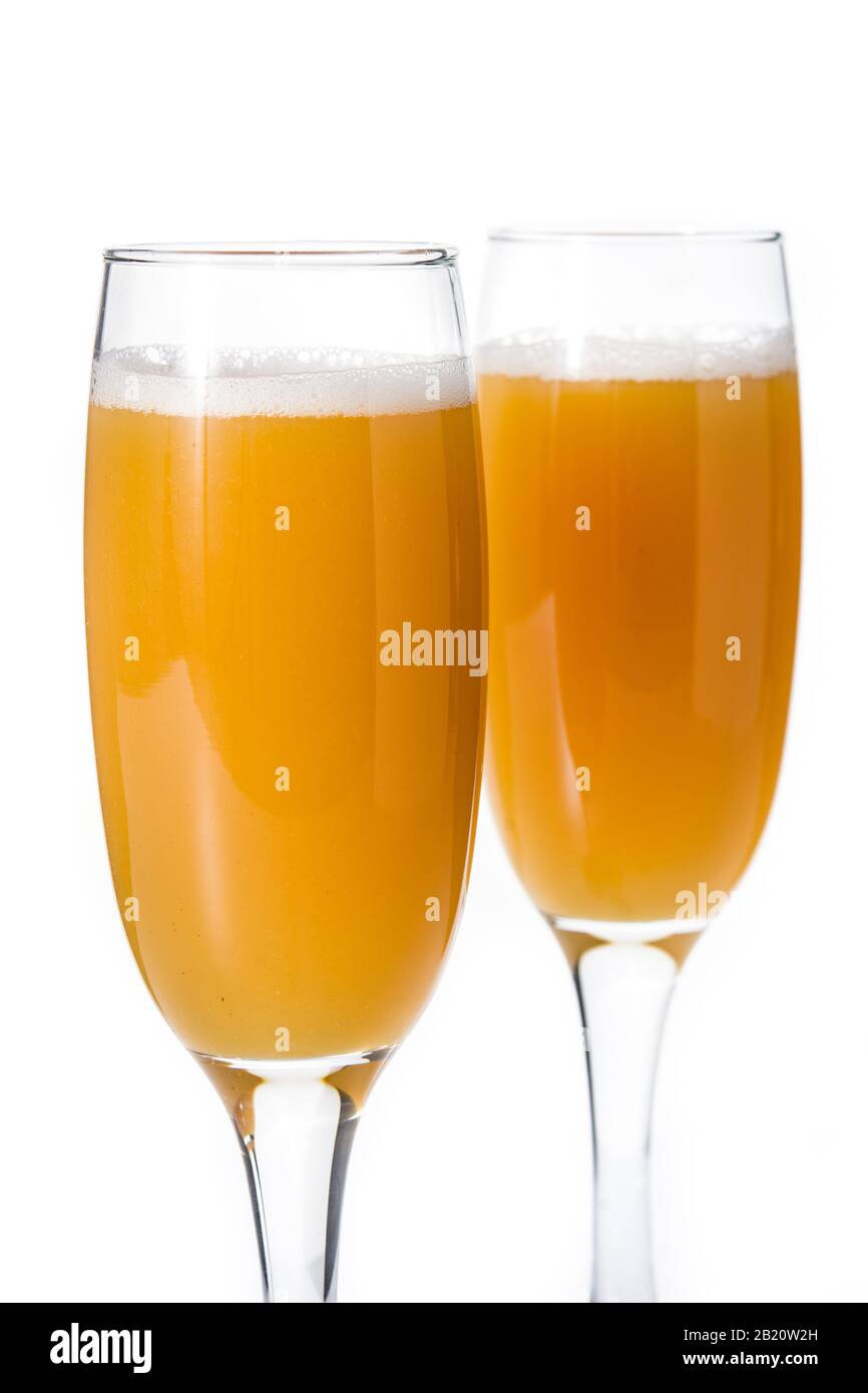 Bellini champagne cocktail isolated on white background Stock Photo - Alamy