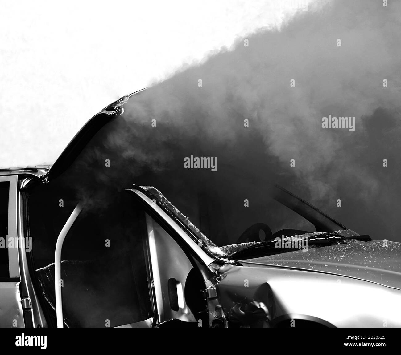 dense black smoke of a broken car after the road accident Stock Photo ...