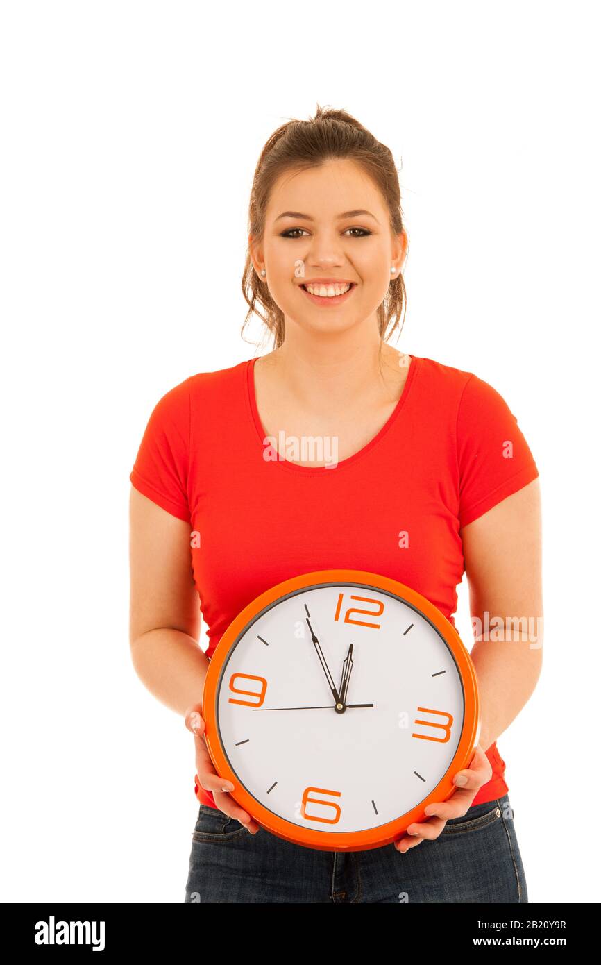 cute woman holding a clock as a simbol of time management Stock Photo ...