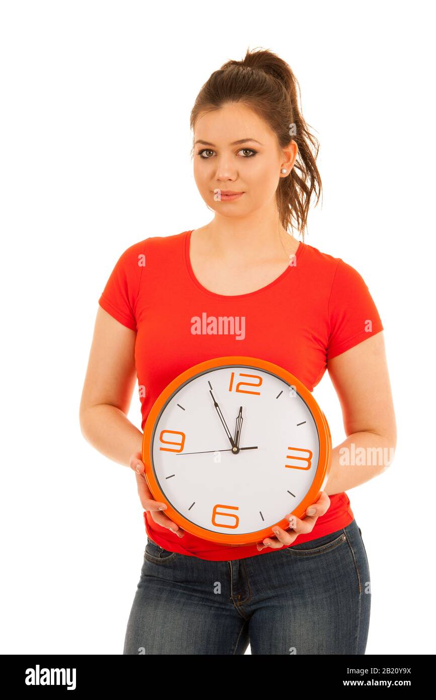 cute woman holding a clock as a simbol of time management Stock Photo ...