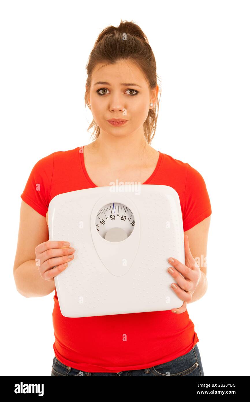 woman holding a scale isolated over white background Stock Photo - Alamy