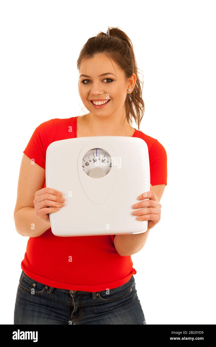 woman holding a scale isolated over white background Stock Photo - Alamy