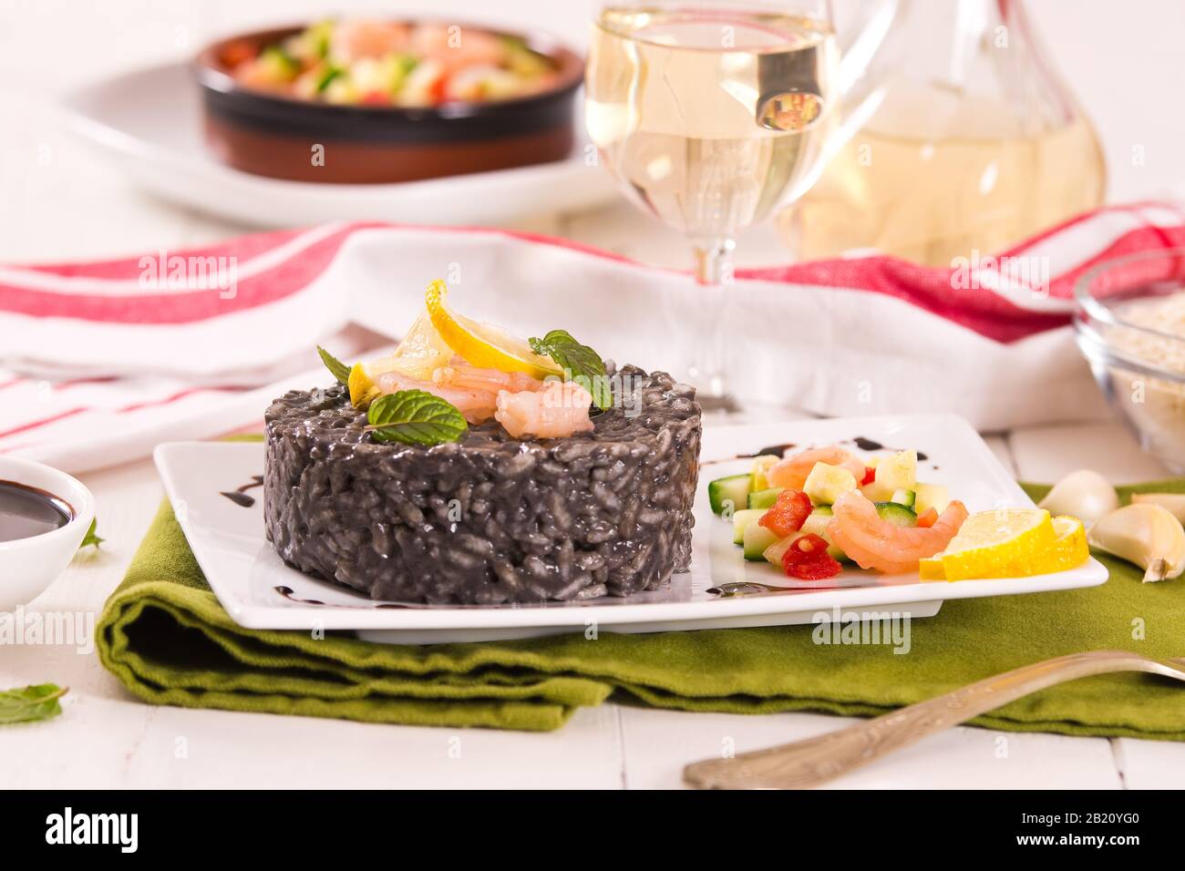 Squid ink risotto Stock Photo - Alamy